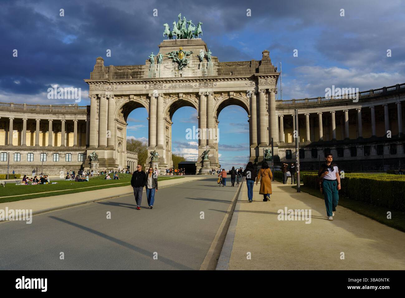 Brussels, Belgium. March 22, 2025 - People walking outside Triumphal ...