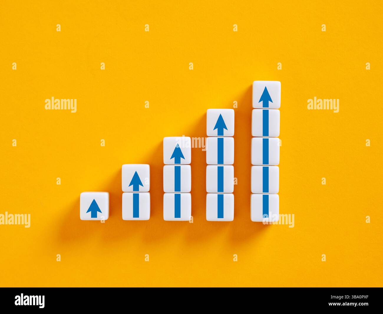 Stack of blocks showing upward trend, representing growth and success ...