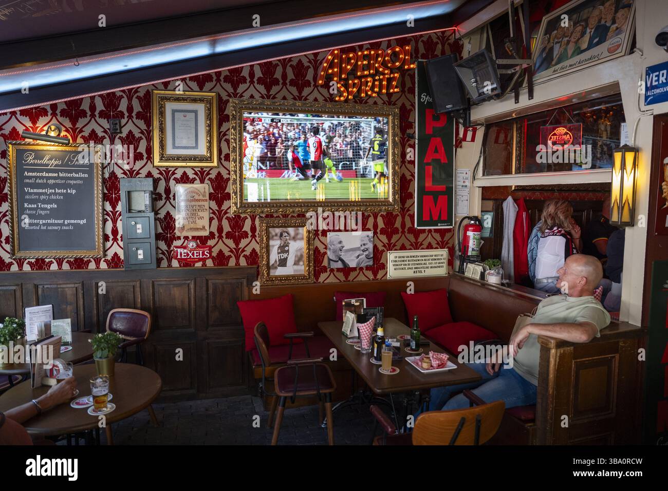AMSTERDAM - Ajax fans follow the premier league match between Feyenoord ...