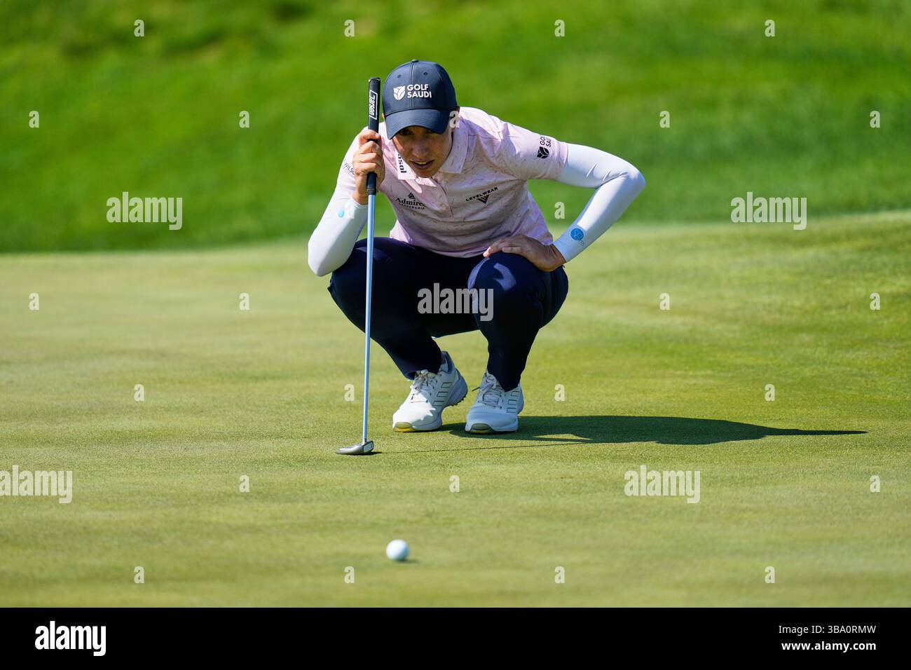 Carlota Ciganda, of Spain, lines up a putt on the 3rd green during the ...