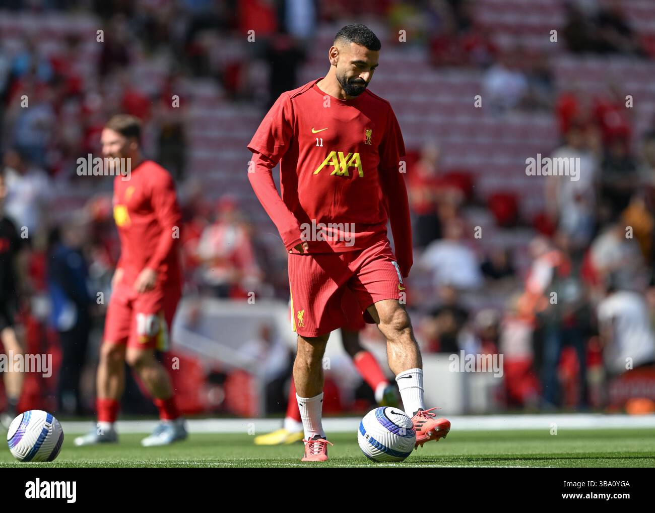 Liverpool, UK. 11th May, 2025. Mohamed Salah of Liverpool warms up ...