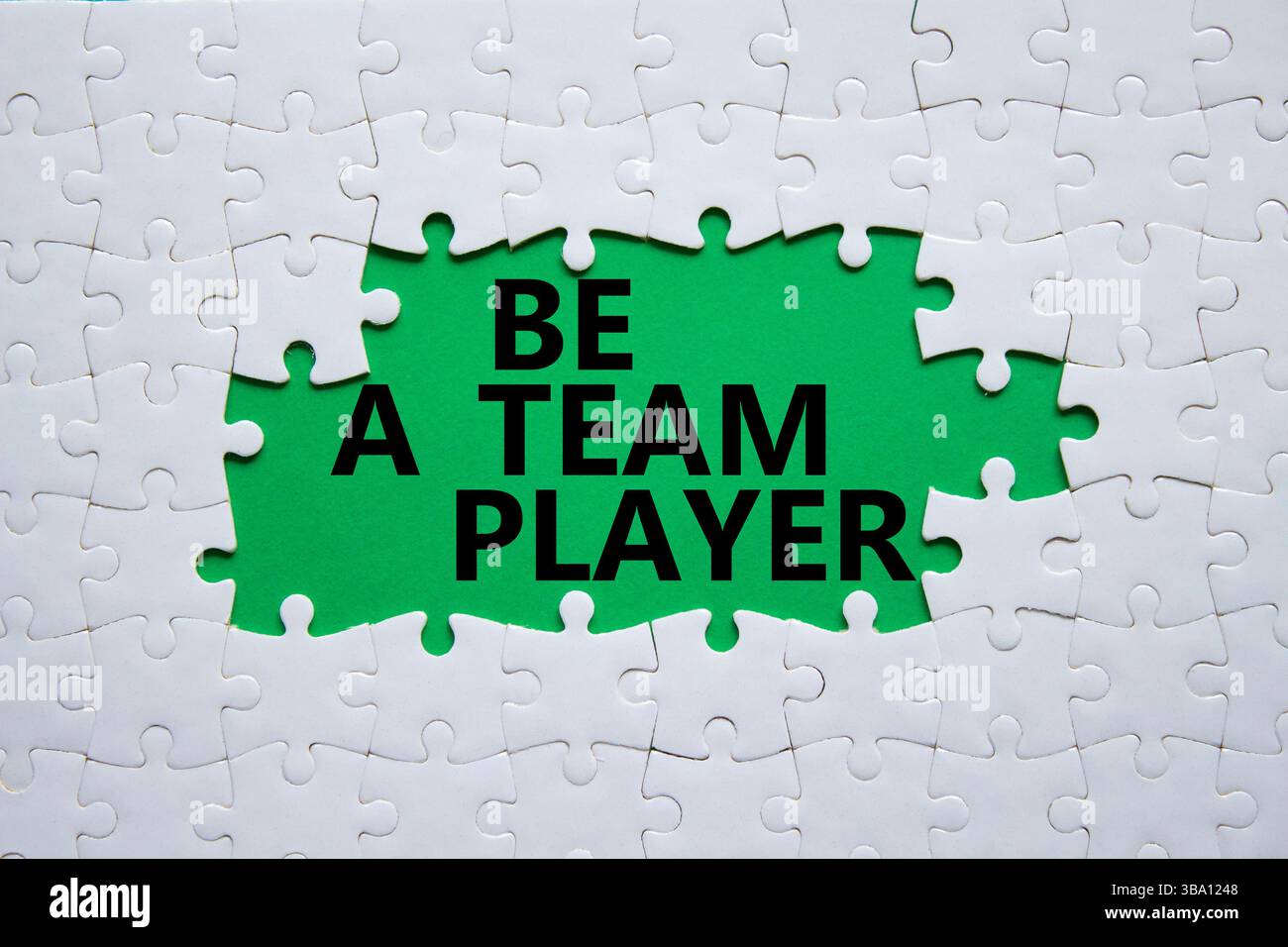 Be a team player symbol. Concept words Be a team player on white puzzle ...