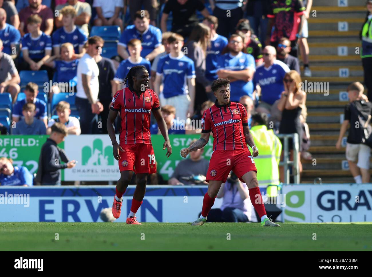 Walsall's Alfie Chang celebrates scoring their side's first goal of the ...