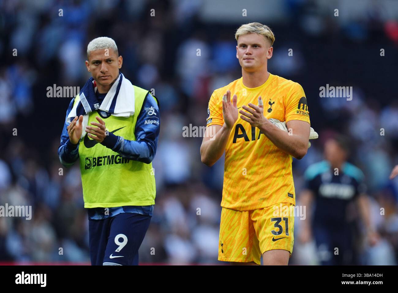 Tottenham Hotspur goalkeeper Antonín Kinsky (right) and Richarlison ...