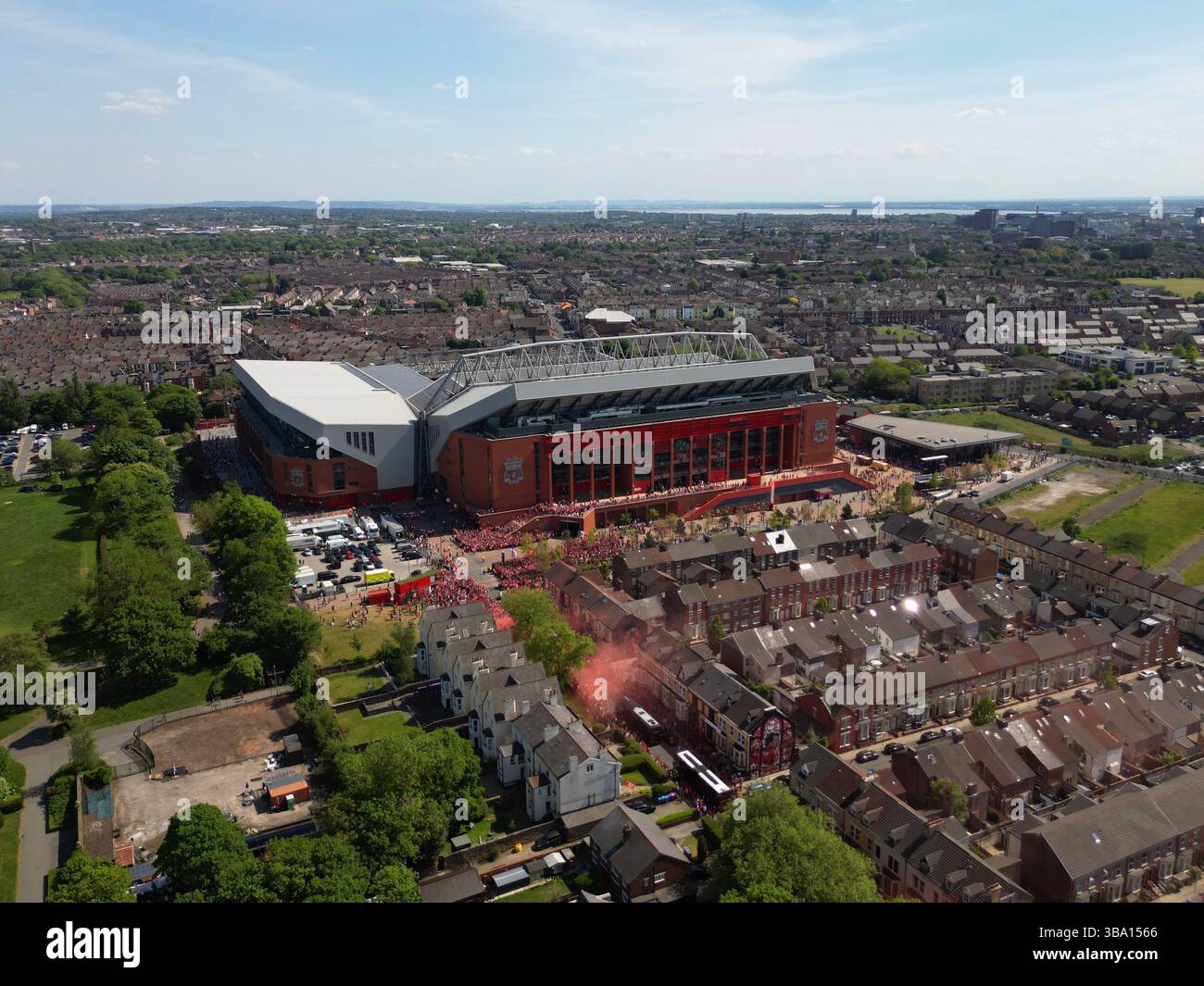 Liverpool, UK. 11th May, 2025. Supporters welcome the LFC coach with ...