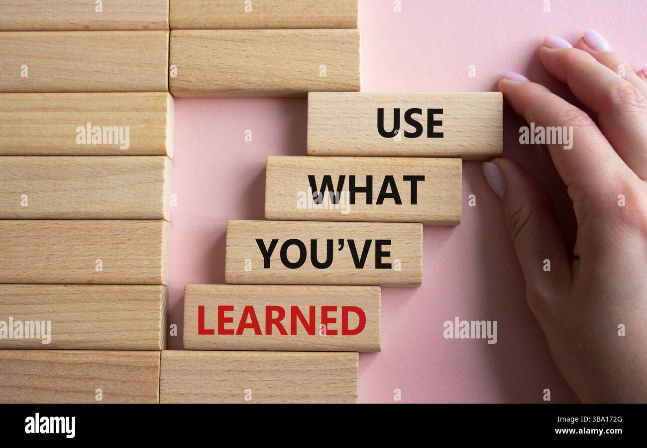 Use what You have learned symbol. Wooden blocks with words Use what You ...