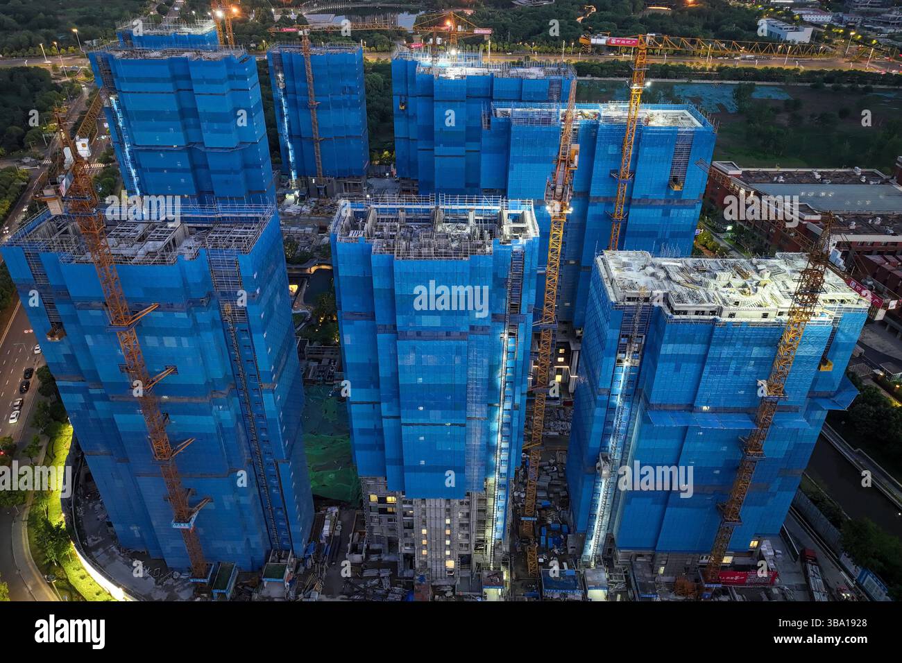 A night view of a residential project under construction in Nanjing ...