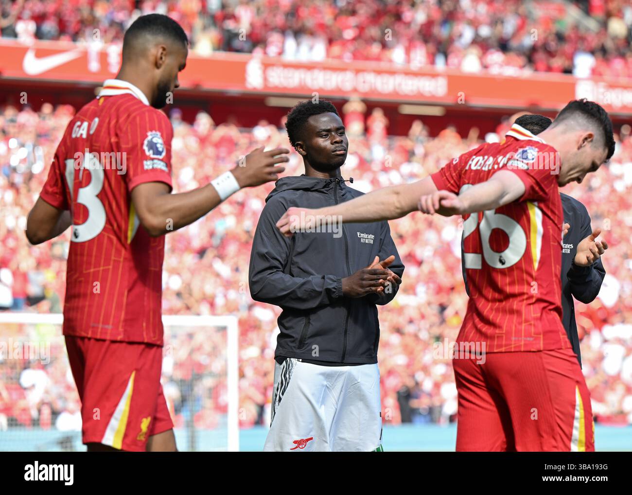 Liverpool, UK. 11th May, 2025. Bukayo Saka of Arsenal joins the guard ...