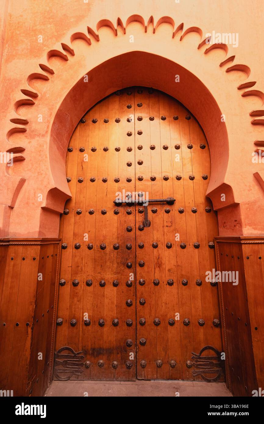 Traditional Moroccan architecture showcasing a sturdy wooden door, set ...