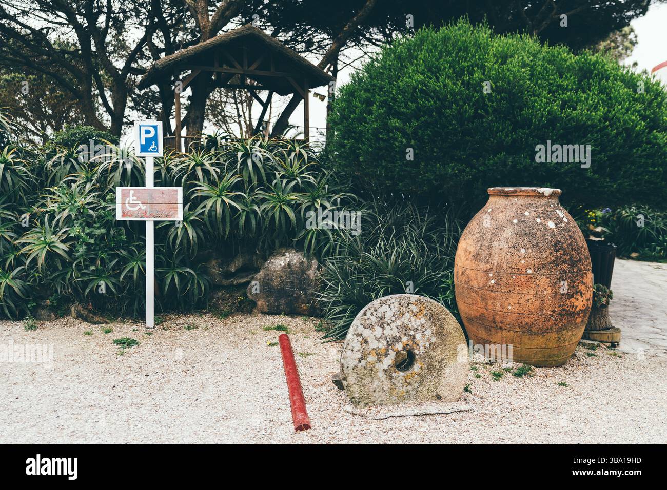 Decoratively designed handicapped parking space featuring rustic ...