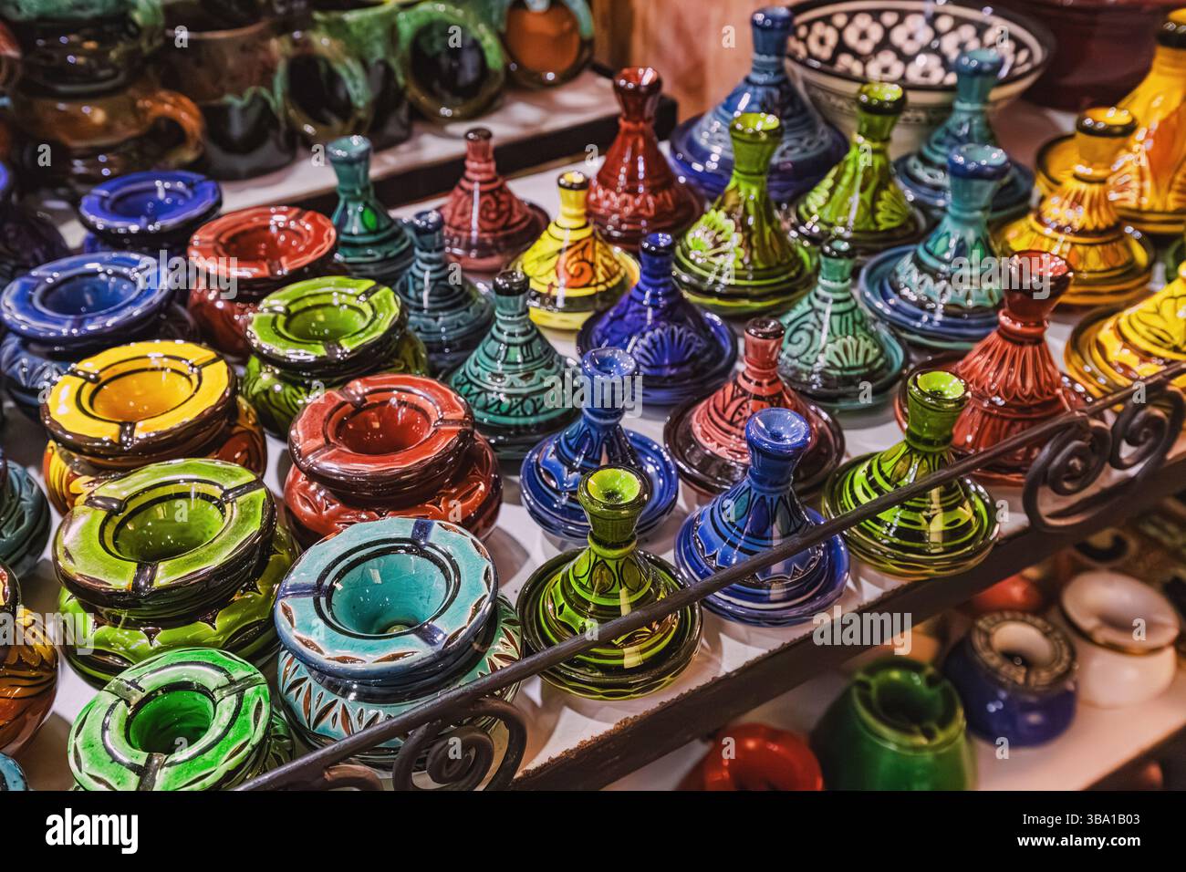 Traditional Moroccan pottery, featuring vibrant ashtrays and tagines ...