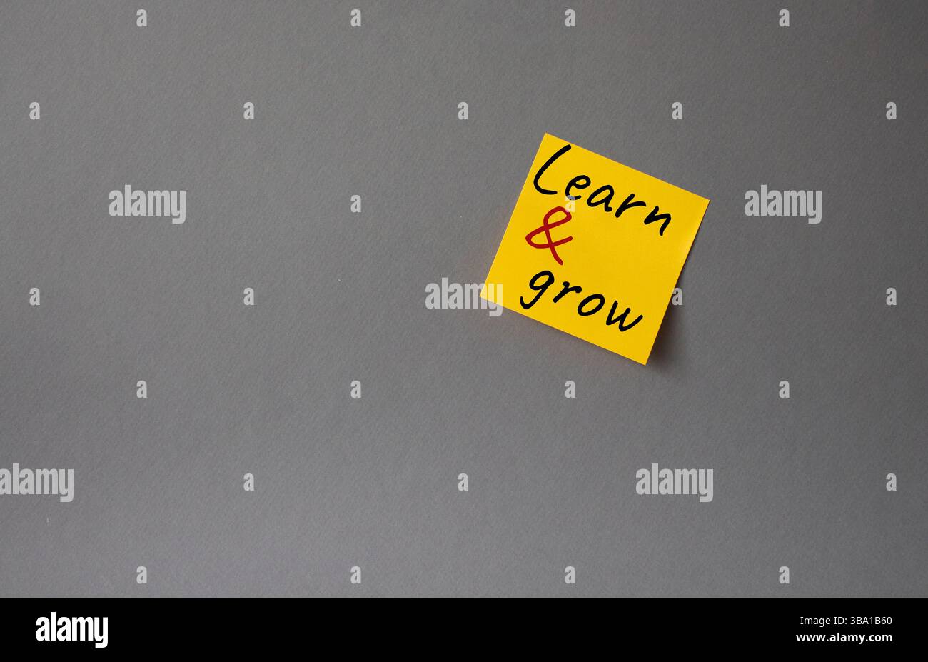 Learn and grow symbol. Concept words Learn and grow on orange steaky ...