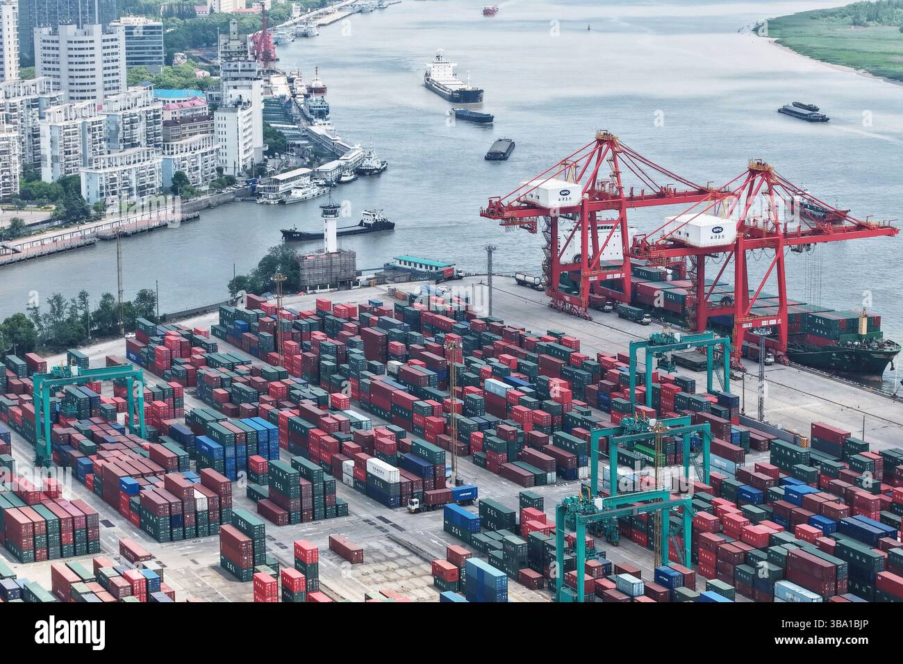 Aerial view of containers waiting for shipment at a port in Shanghai ...