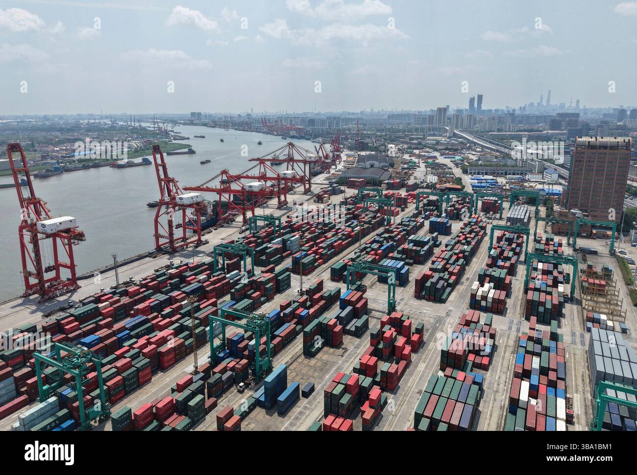 Aerial view of containers waiting for shipment at a port in Shanghai ...