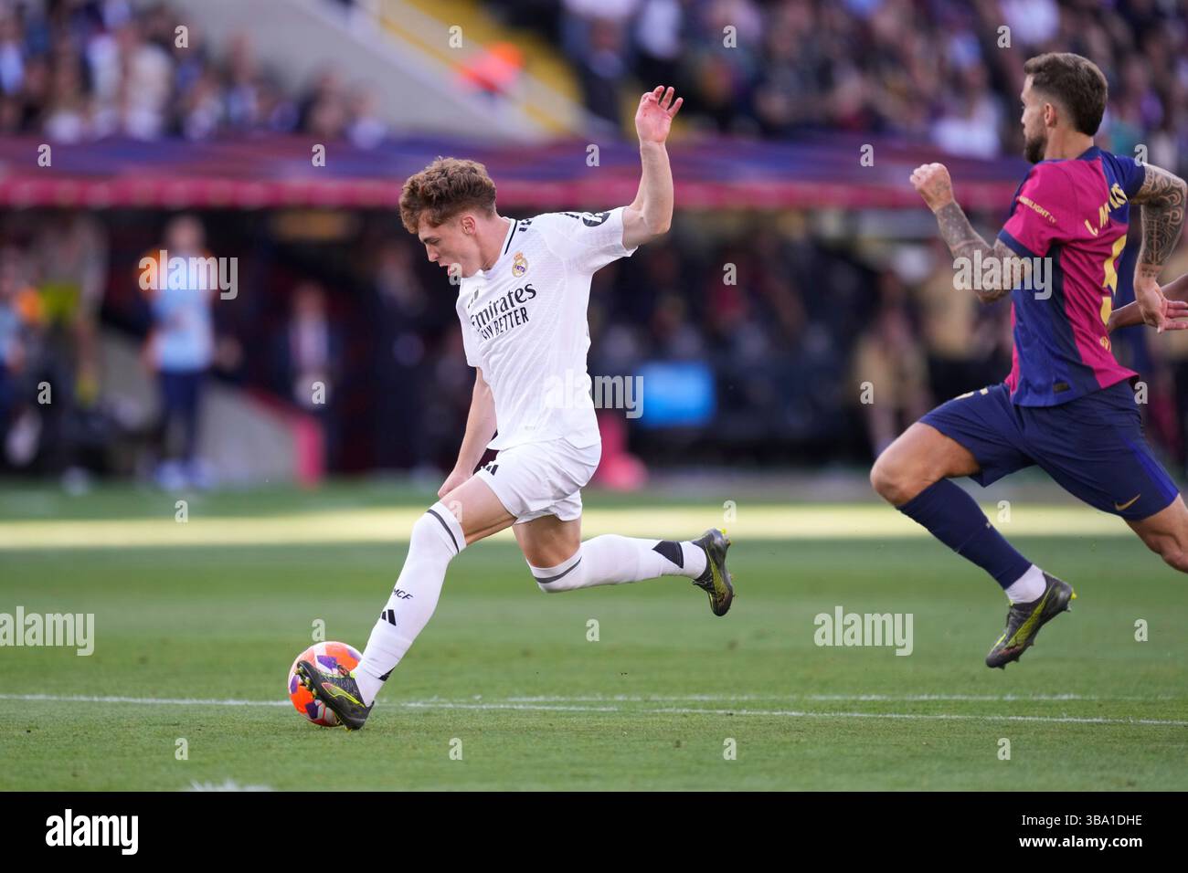 Real Madrid's Victor Munoz, left, attempts a shot on goal during the Spanish La Liga soccer ...
