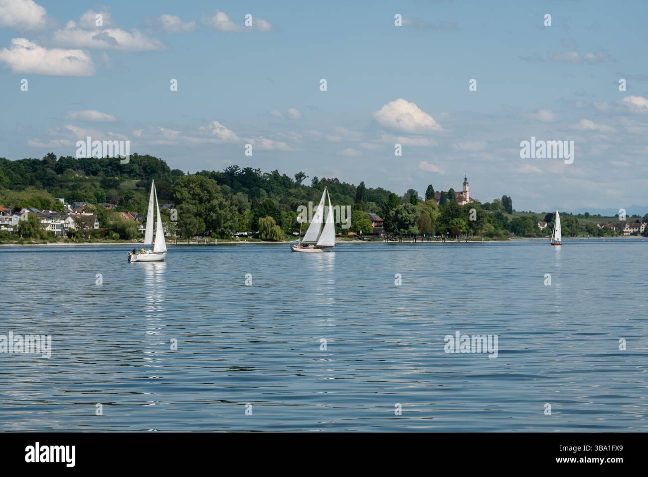 11 May 2025, Baden-Württemberg, Überlingen: Sailing boats are out on ...