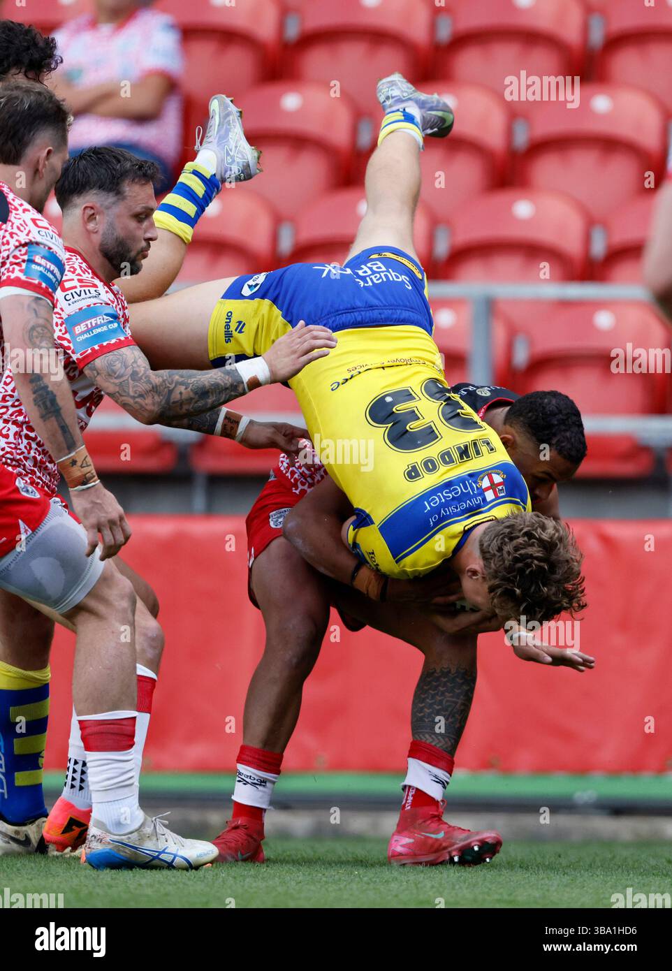 Warrington's Arron Lindop makes a tackle during the Betfred Challenge ...