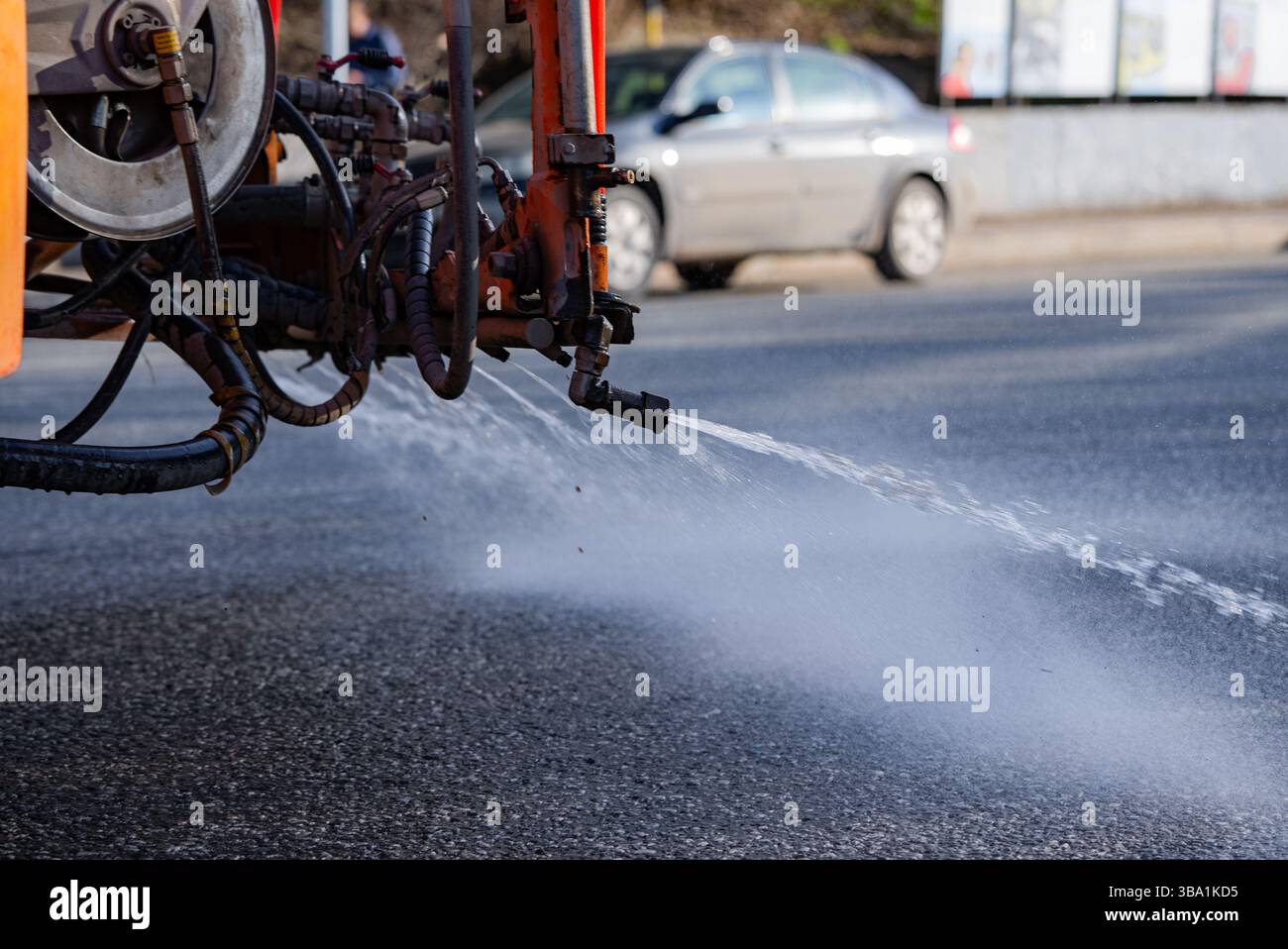 Machine spraying water onto hi-res stock photography and images - Alamy