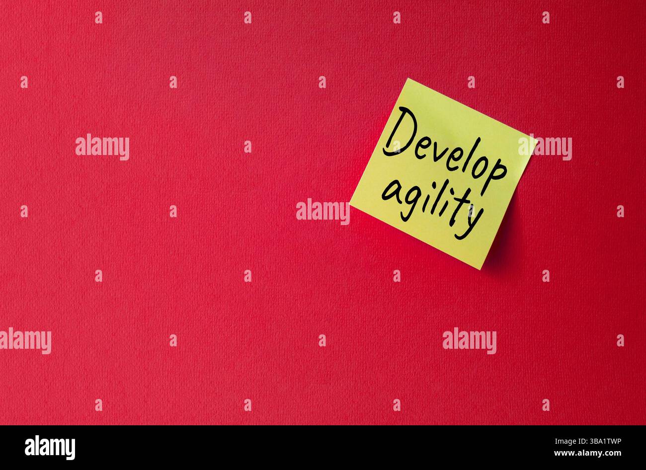 Develop agility symbol. Orange steaky note with concept words Develop ...