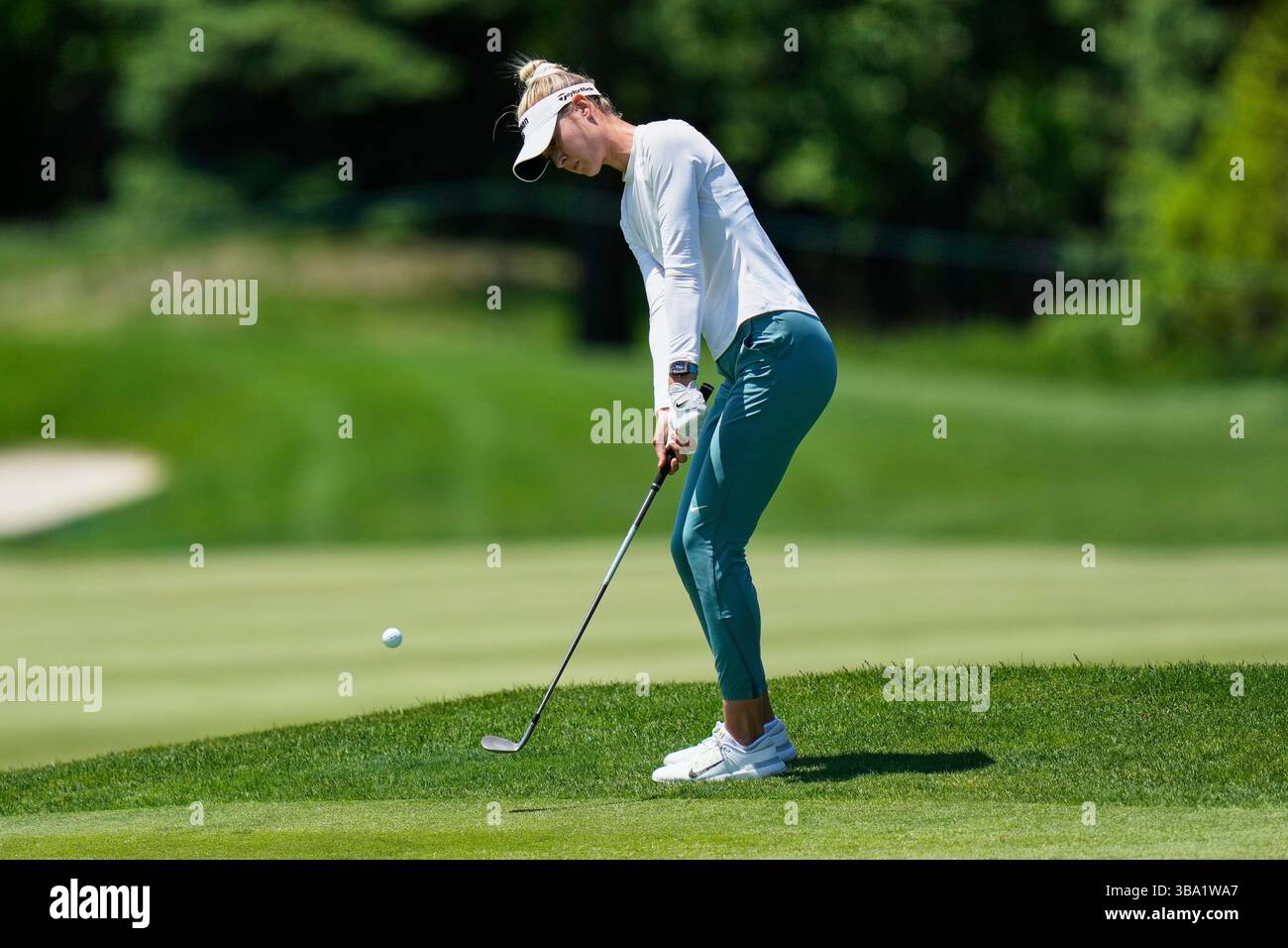 Nelly Korda chips on the 11th hole during the final round of the Mizuho ...