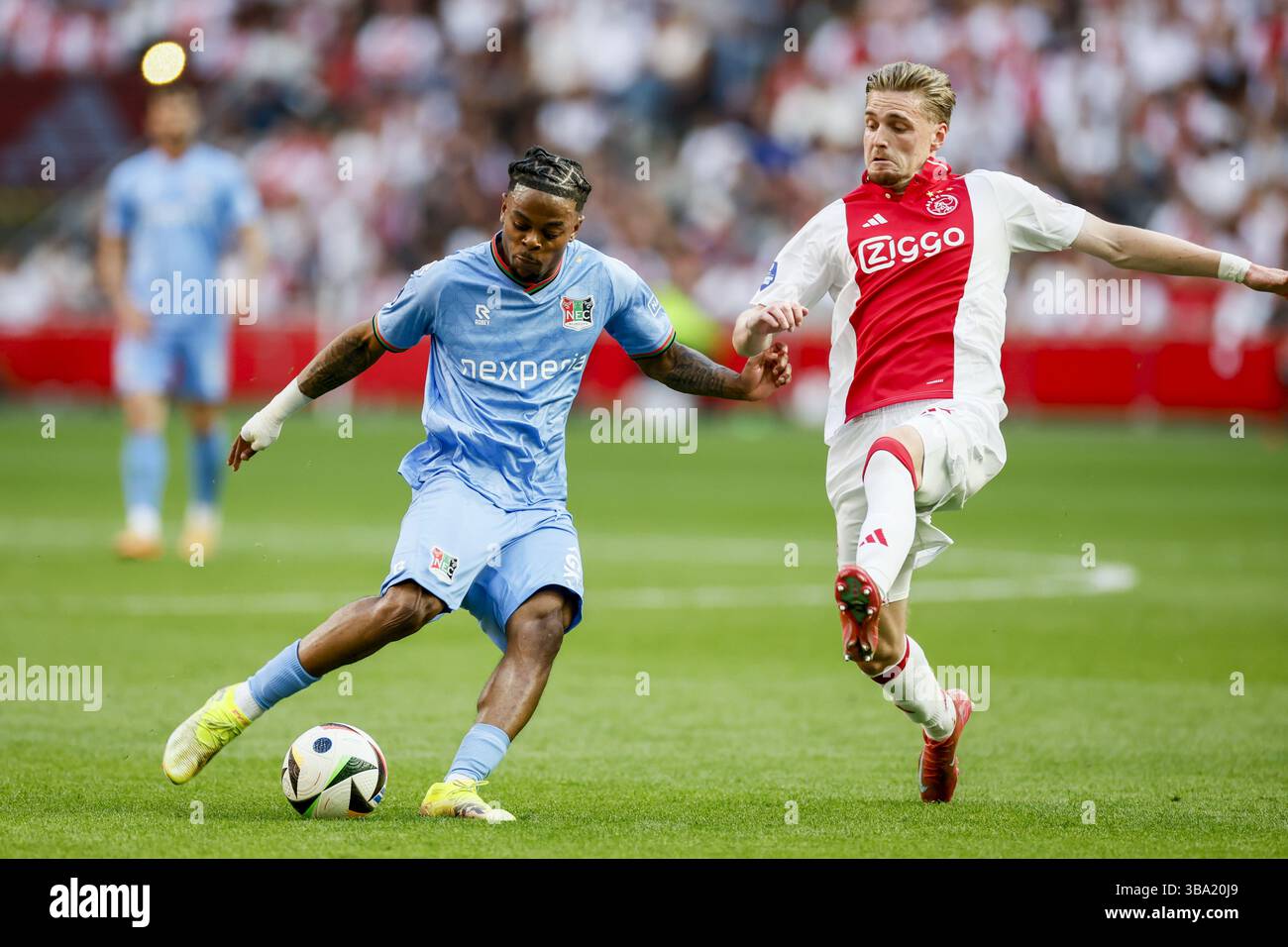 AMSTERDAM - (l-r) NEC player Ivan Marquez scores the opening goal past ...