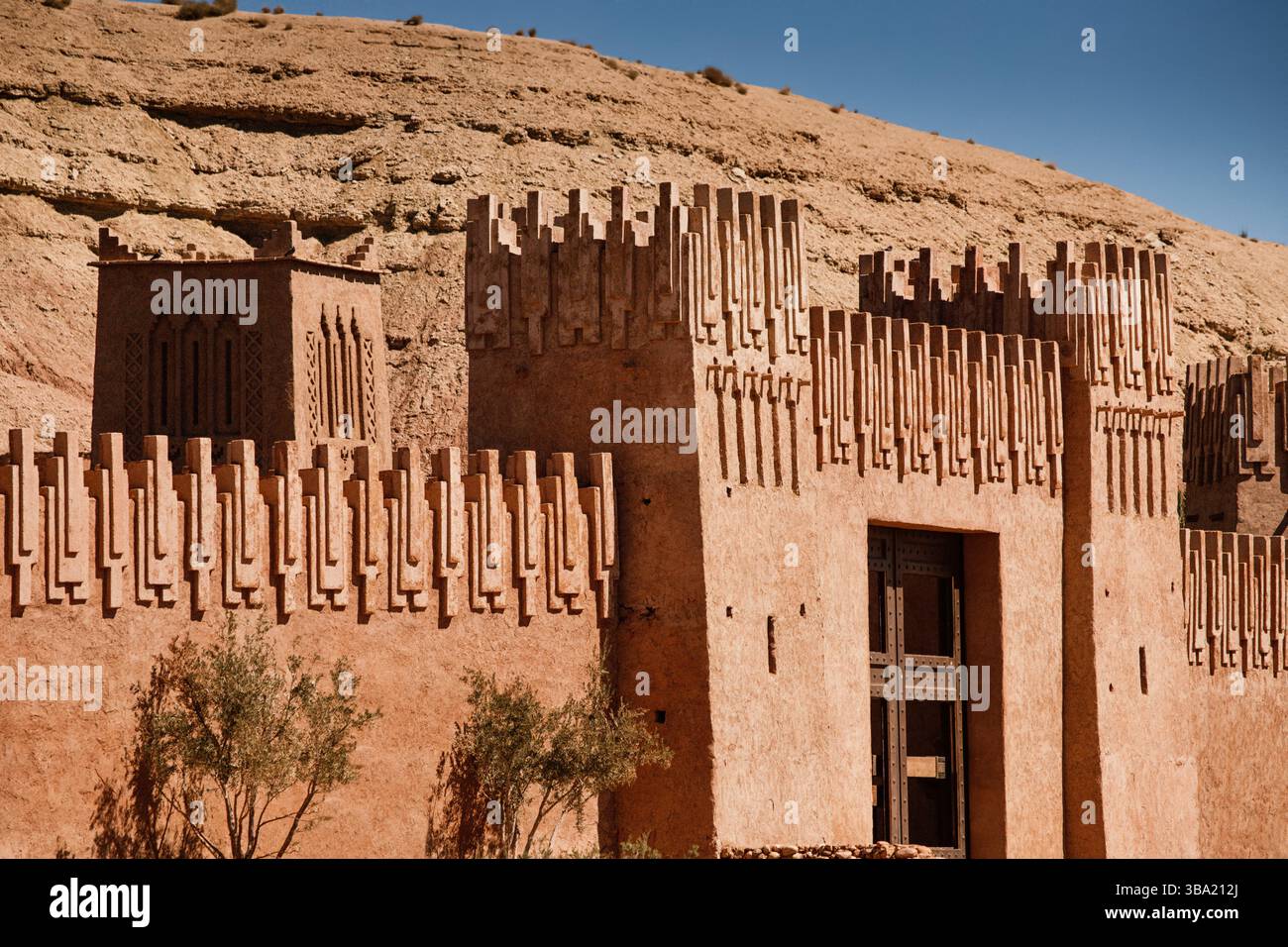 Ancient Moroccan architecture blends seamlessly with the arid landscape ...