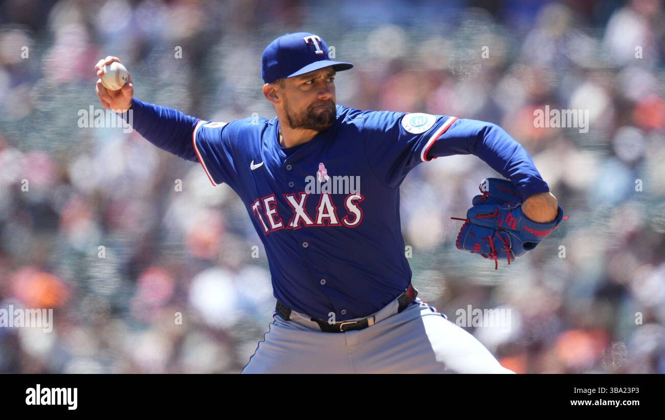 Texas Rangers pitcher Nathan Eovaldi throws against the Detroit Tigers ...