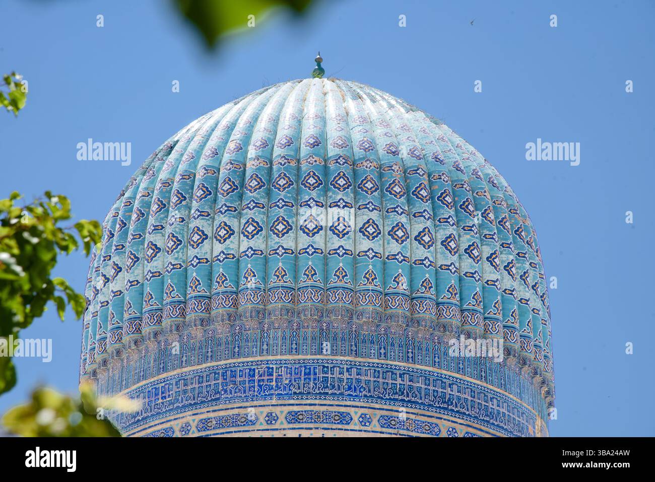 Ornately decorated azure fluted dome at Bibi-Khanym Mosque in Samarkand ...