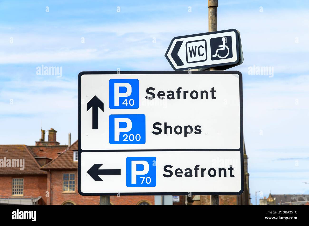 Direction signs to Seafront, Shops and Public Toilets, Scotland, UK ...