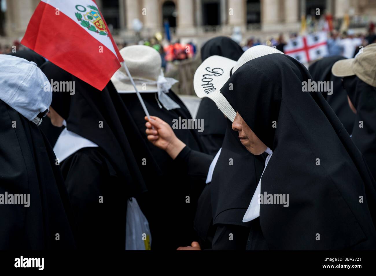 Vatican City, Vatican. 11th May, 2025. A nun with a hat written on ...