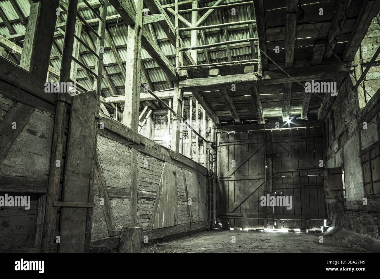 Urban exploring in an old abandoned farm house, a lost place with dirty ...