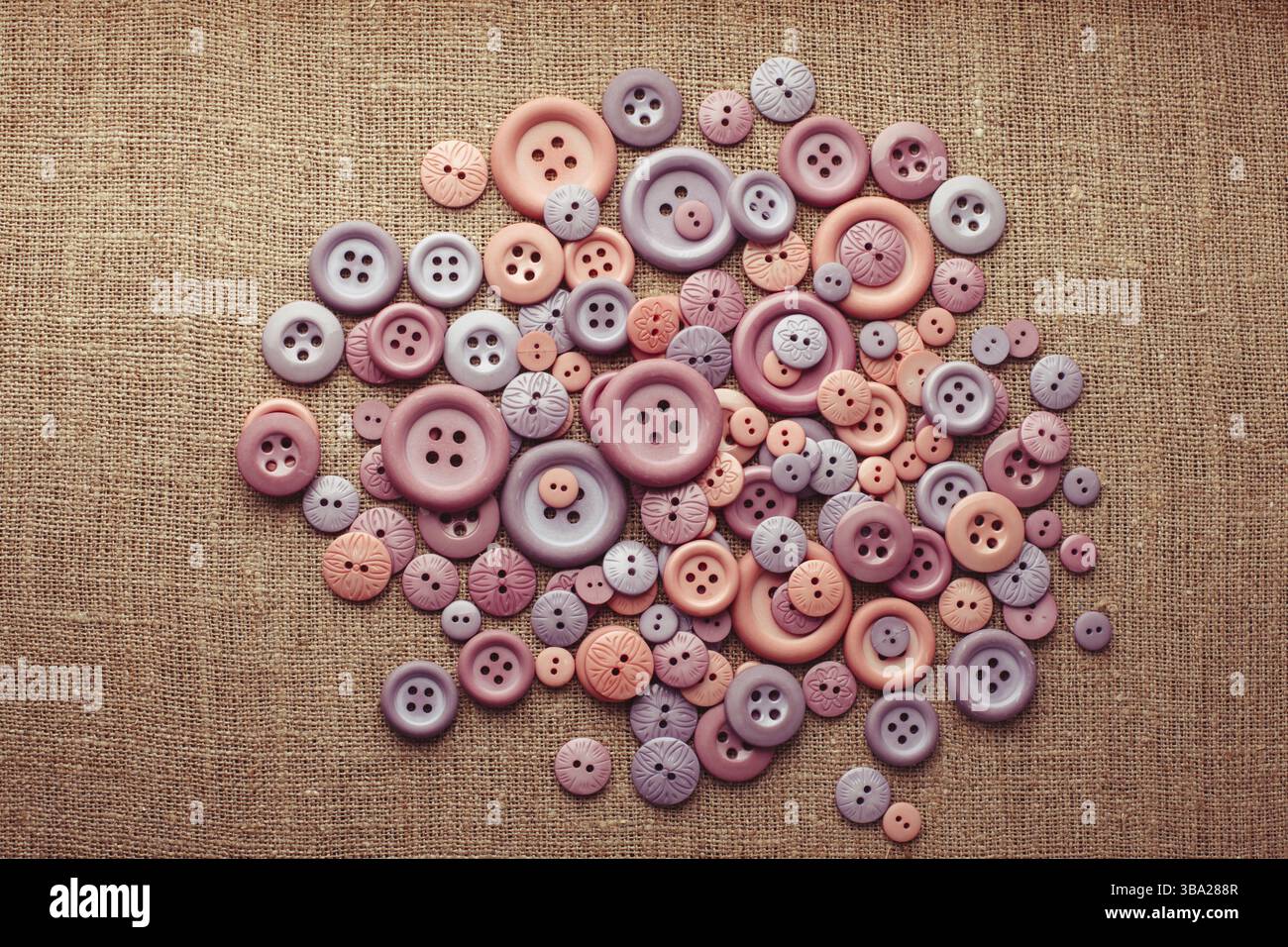 The collection with many buttons of different colors, shape and sizes ...