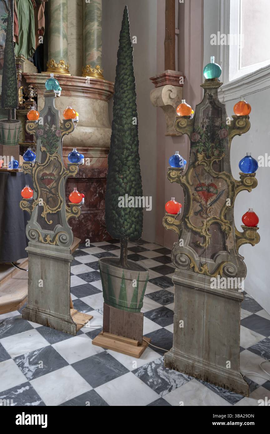 On contour-cut and painted boards with religious motifs in front of the ...