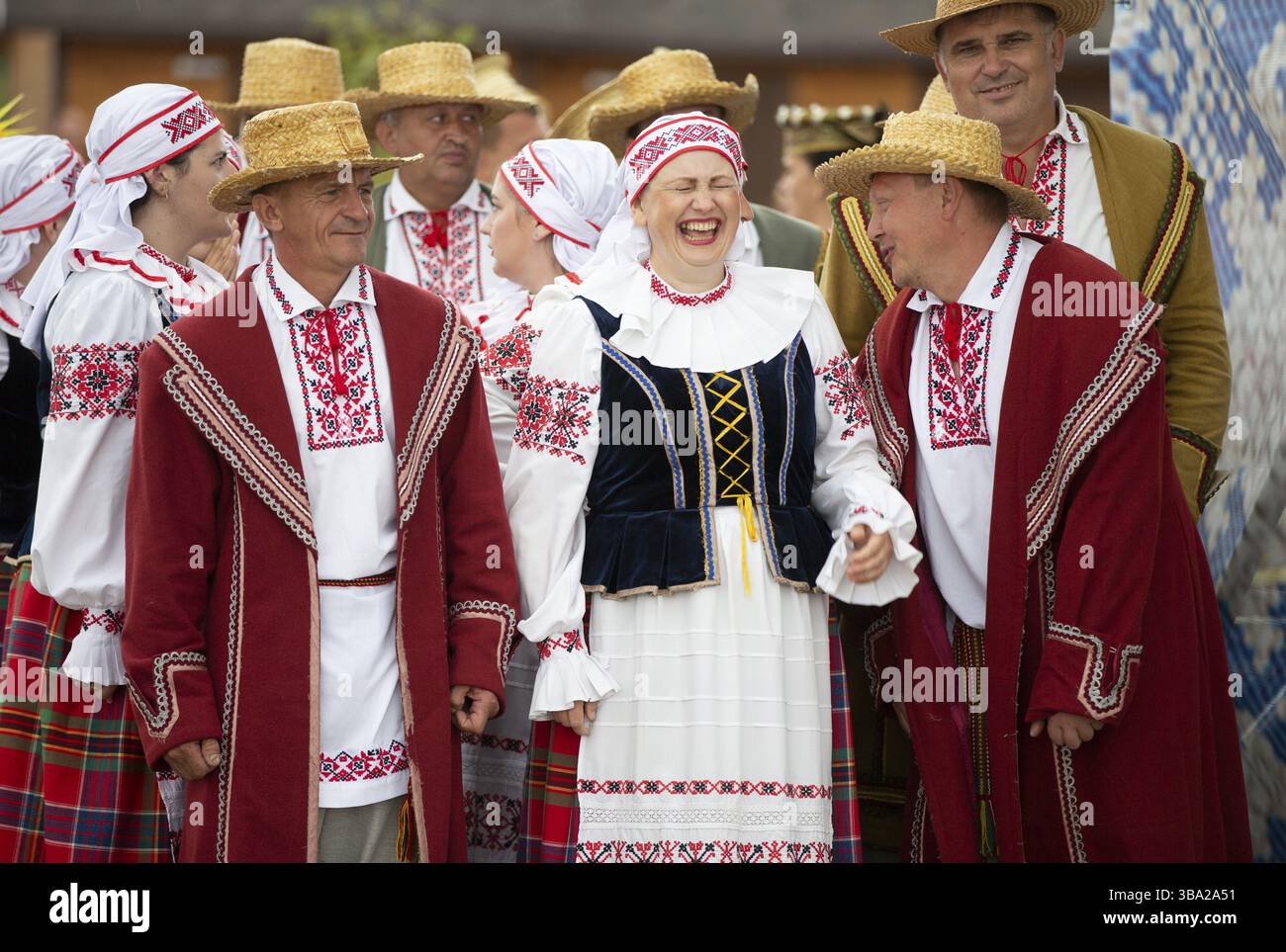 A group of Slavic people in national Belarusian costumes Stock Photo ...