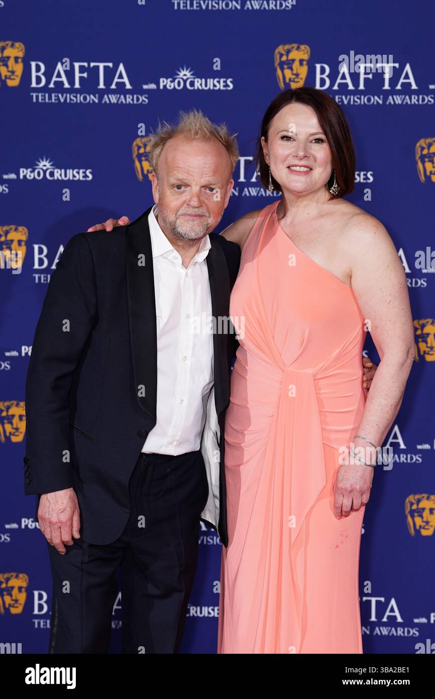 Toby Jones and Monica Dolan in the press room during the 2025 BAFTA ...