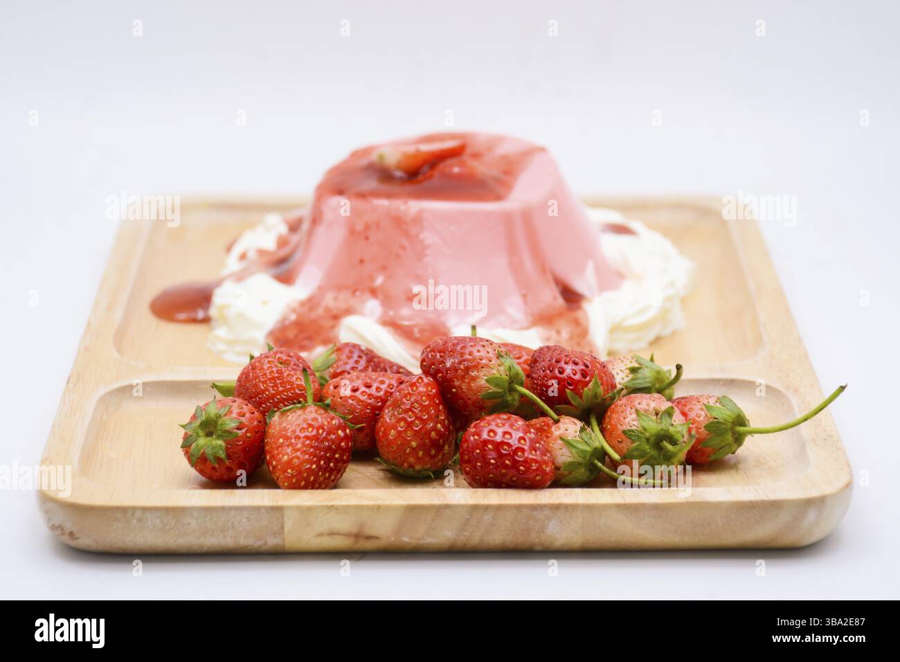 Italian dessert Pana Cotta with strawberries Stock Photo - Alamy