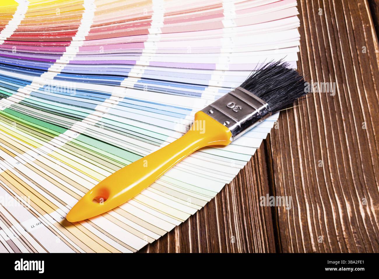 Paper samples palette with brush for choosing wall color for painting ...