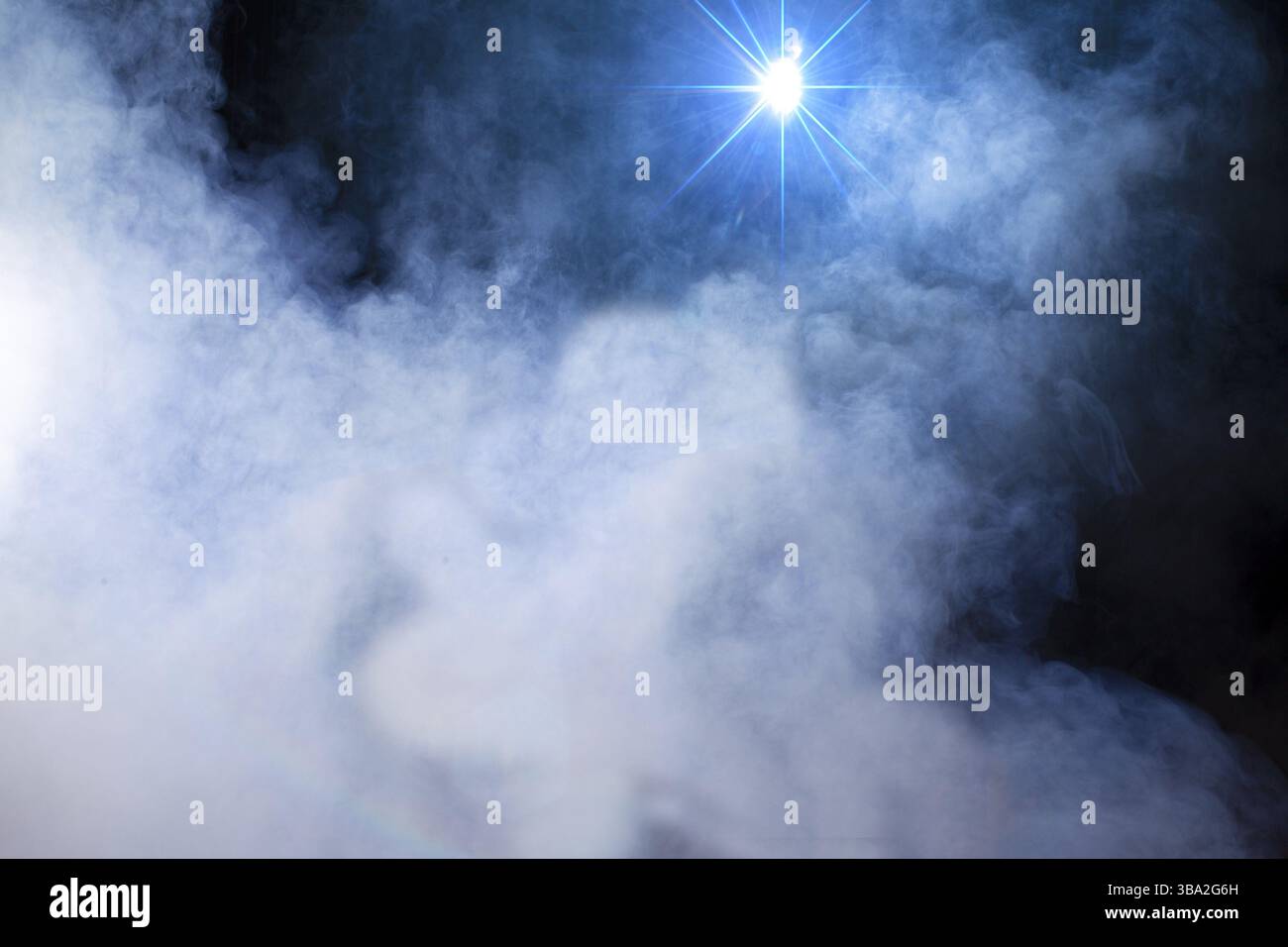 Stage smoke blue with light beam.Smoke star Stock Photo - Alamy