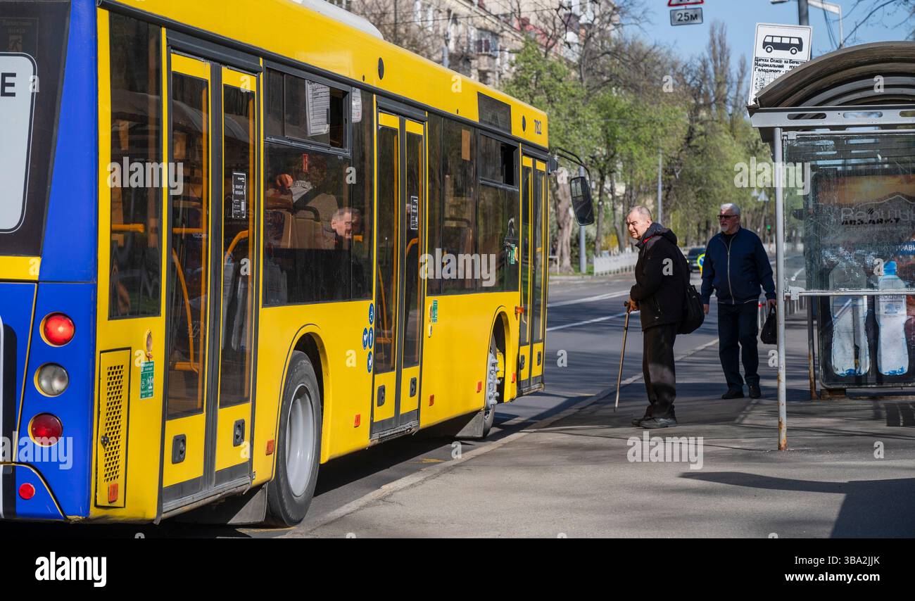 Kyiv, Ukraine - 1st May, 2025: Two senior adult men are waiting at the ...