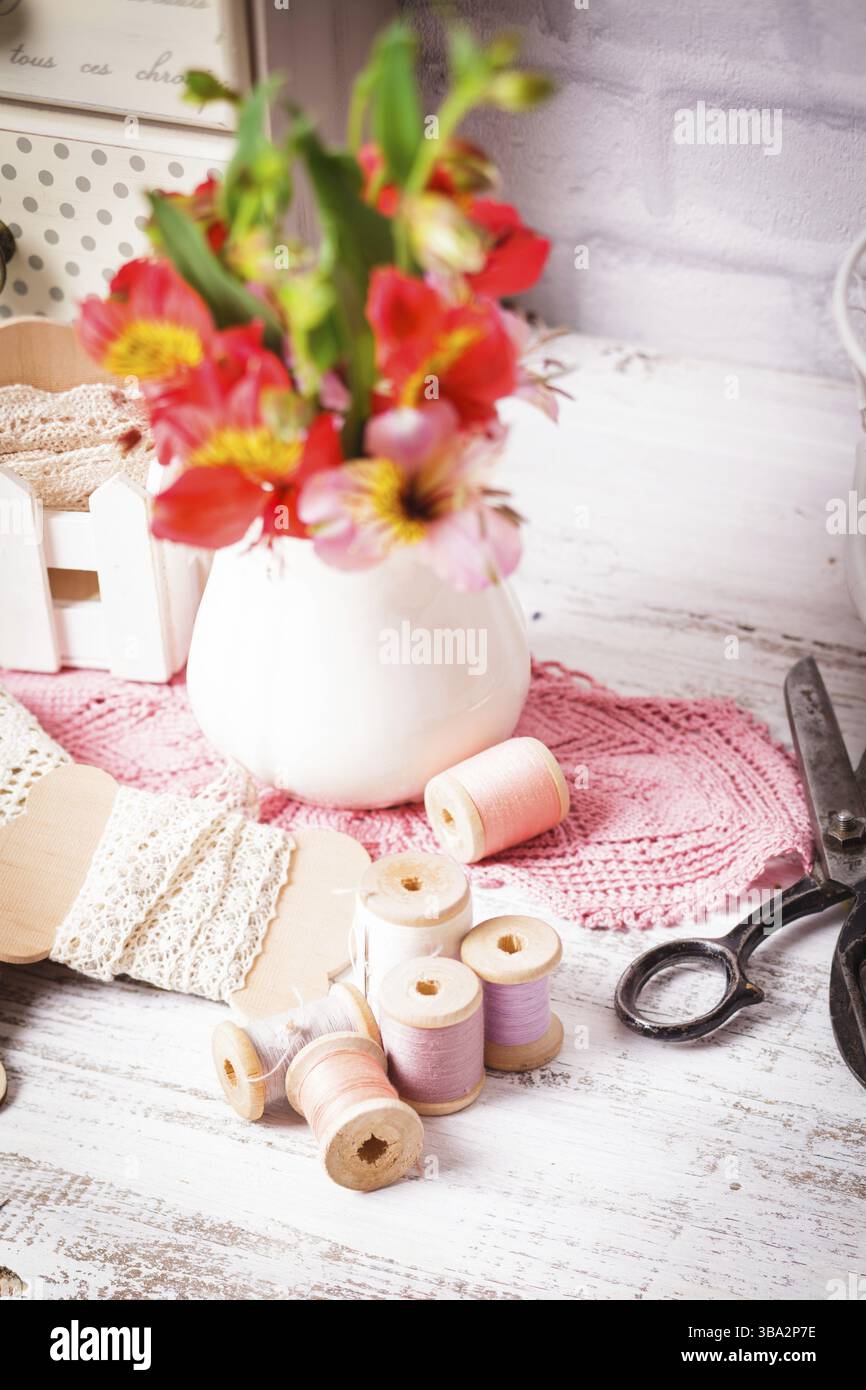 Vintage still life with handcraft materials and flowers Stock Photo - Alamy