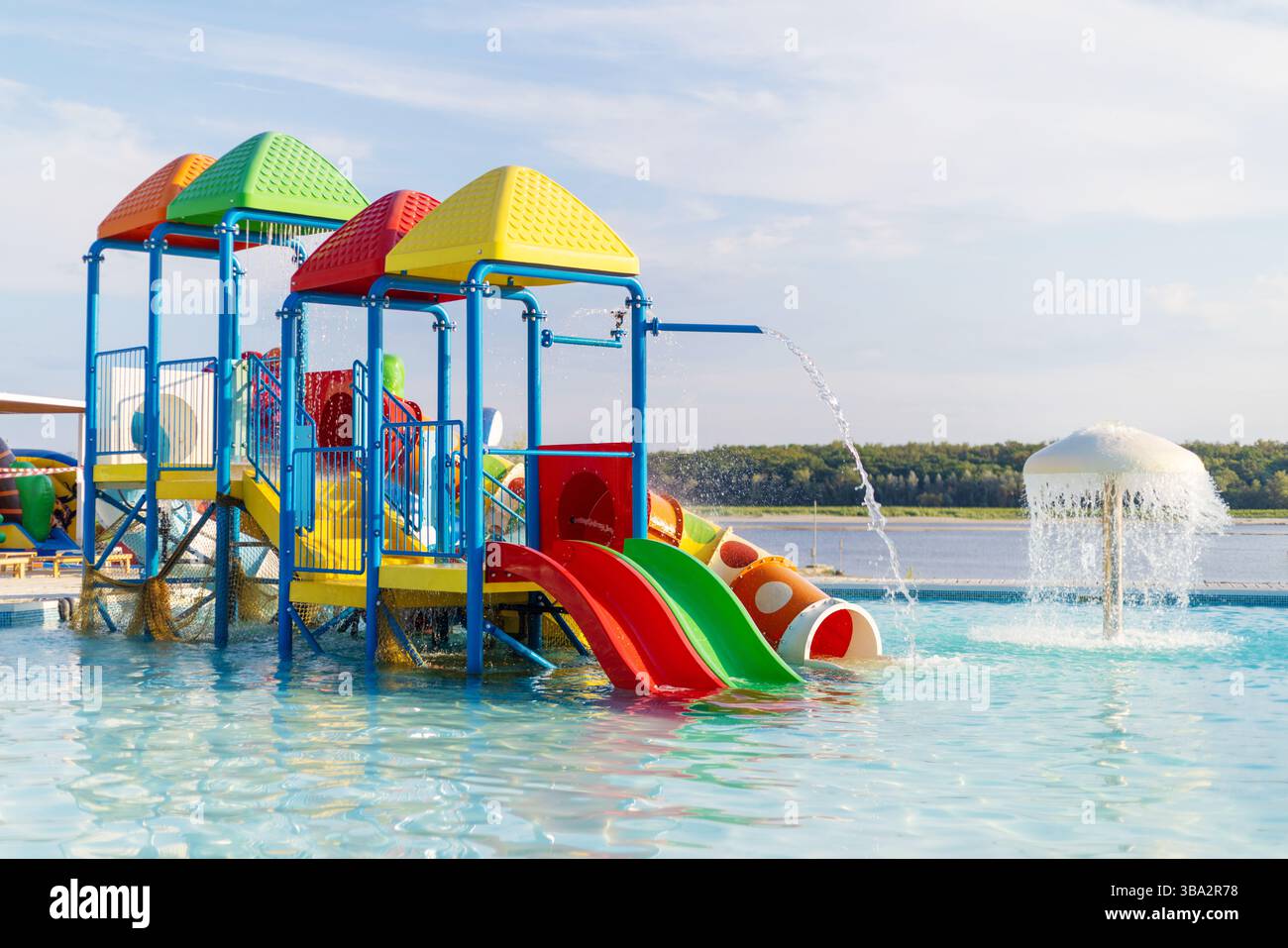 Colorful waterpark playground with slides Stock Photo - Alamy