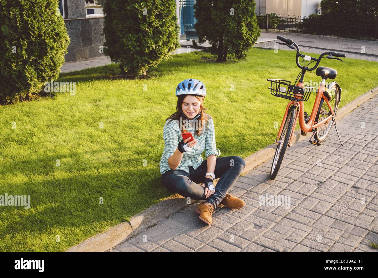 Subject ecological mode of transport bicycle. Beautiful young Caucasian ...