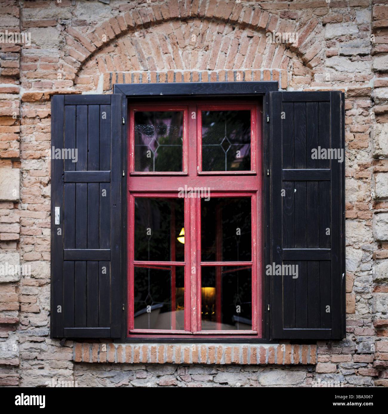 Retro window with black jalousie outdoor and old brich wall Stock Photo ...