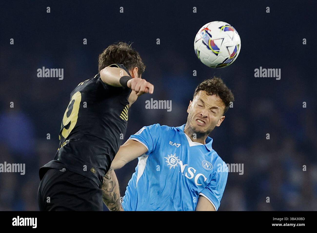 Napoli's Amir Rrahmani challenges for the ball with Andrea Pinamonti of ...