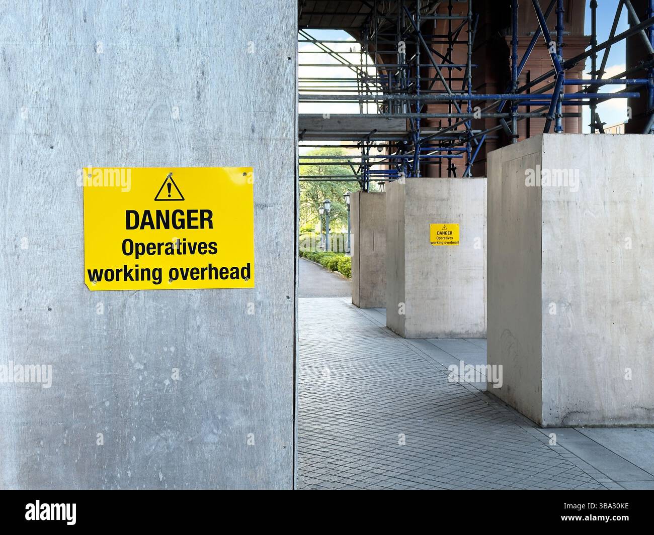 Construction site health and safety sign on fence Stock Photo - Alamy