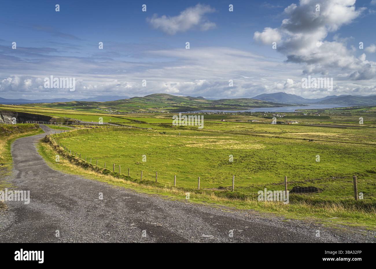 Country road leading from Kerry Cliffs to Portmagee village in a ...