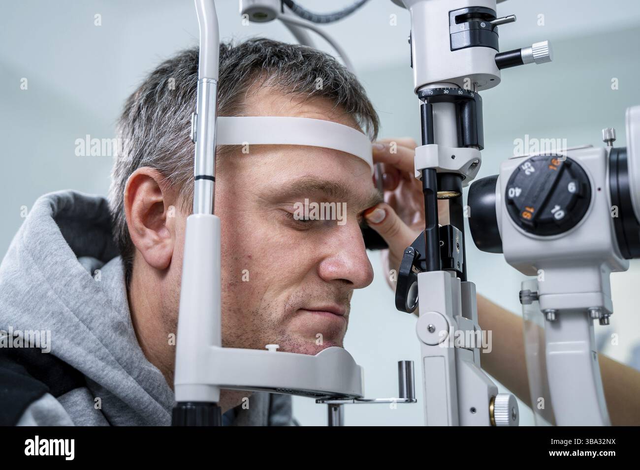 Male patient examining eye structure hi-res stock photography and ...