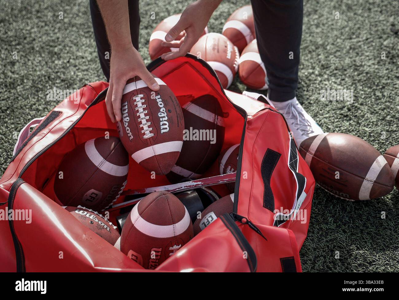 Calgary, Canada. 11th May, 2025. Calgary Stampeders' Mark Vassett sorts ...