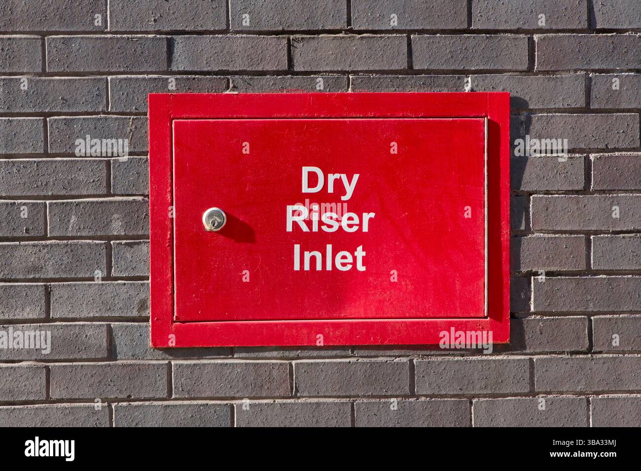 Dry riser inlet cabinet located on building Stock Photo - Alamy