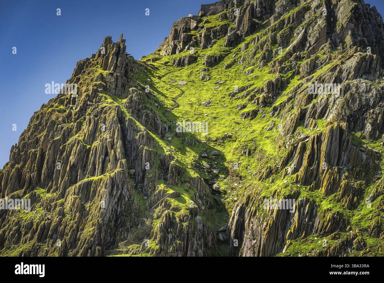 Closeup on steep stairs or ladder carved in stone on Skellig Michael ...